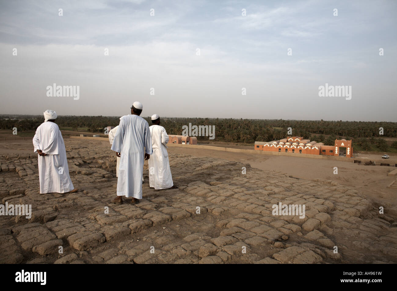 Sudanese tourists standing on the Western Deffufa in Kerma, Sudan ...