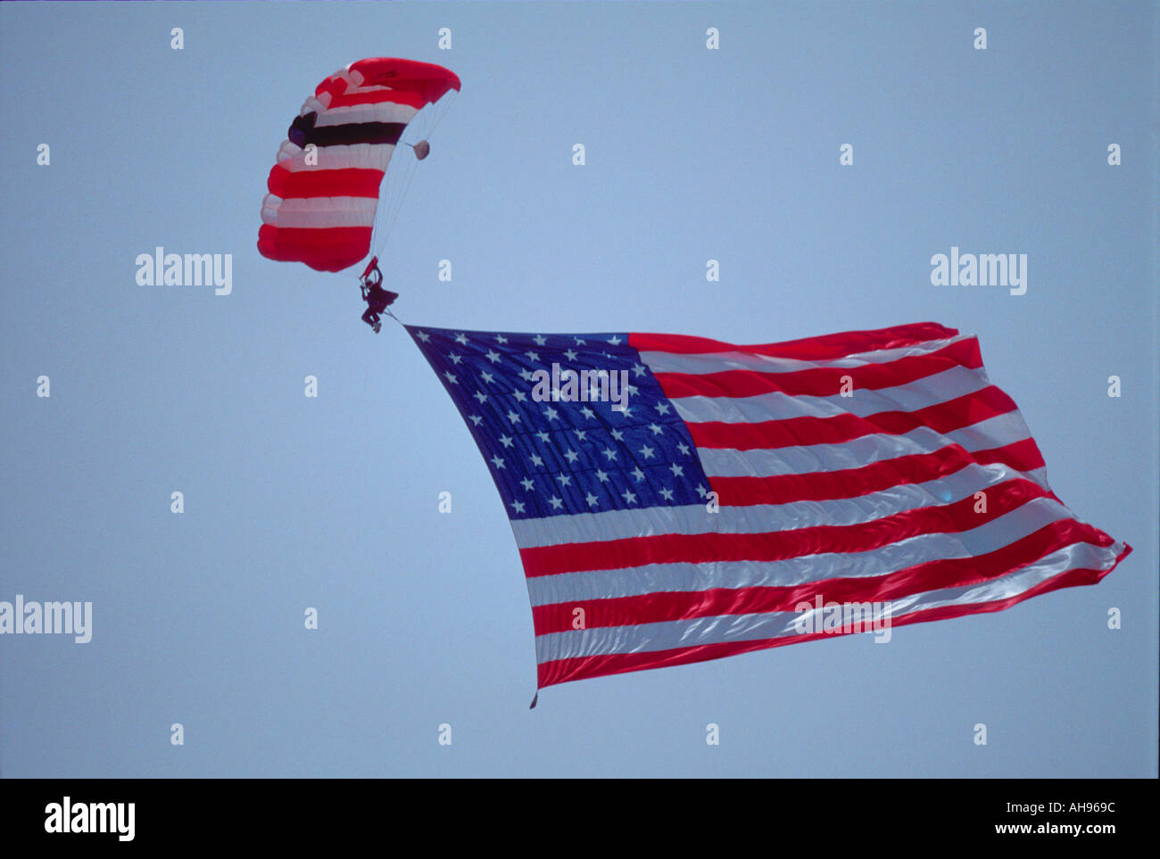 American United States flag and parachutist Stock Photo - Alamy