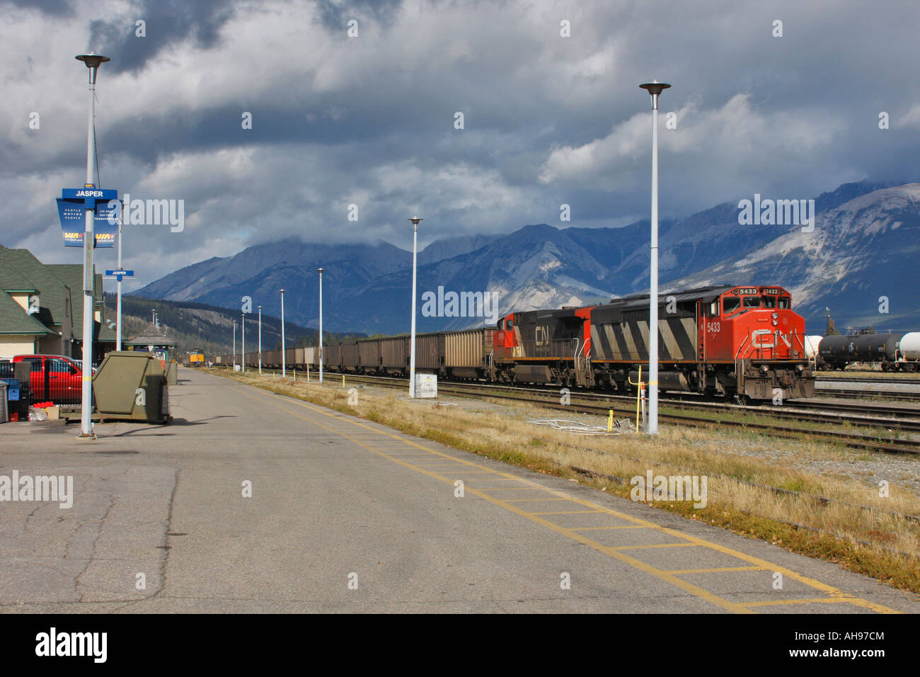 Freight train coming into Jasper railway station in the Canadian ...