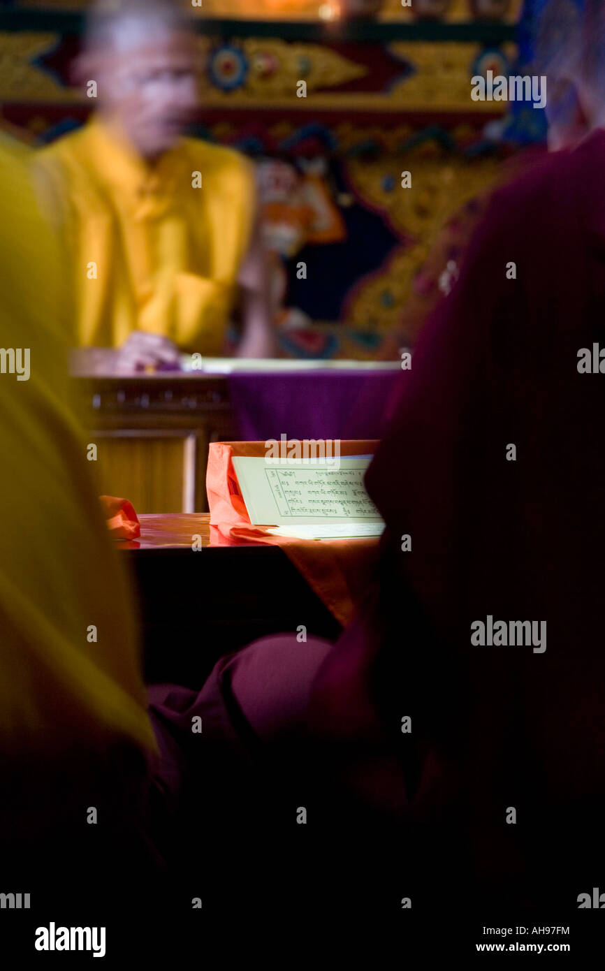 Tibetan monks chanting inside a monastery. Boudhanath stupa ...