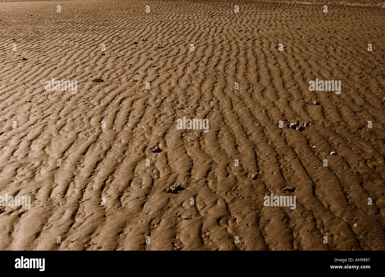 Sand patterns background ripples in sand on beach Stock Photo - Alamy