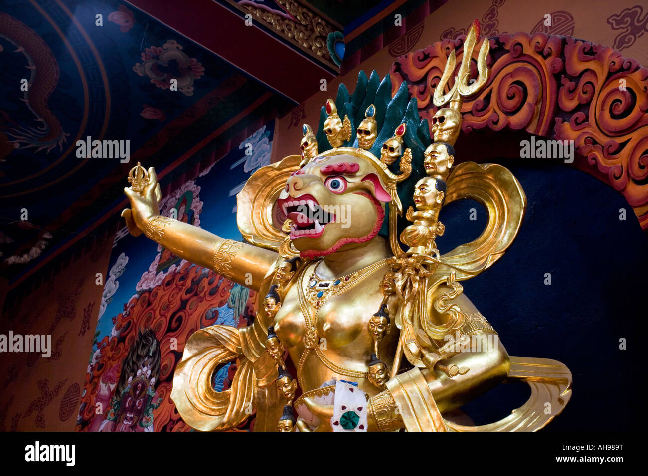 Tibetan buddhist deity golden statue inside a monastery. Boudhanath ...