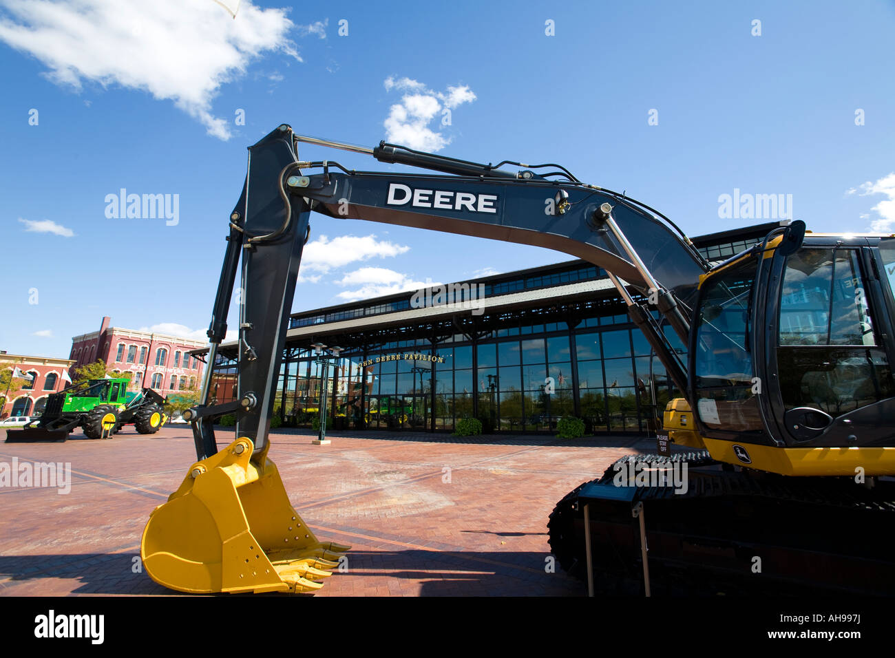 ILLINOIS Moline Earth moving equipment and a tractor in plaza outside ...