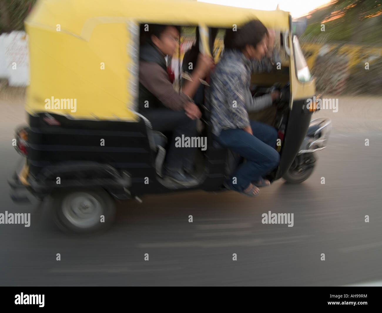 Three wheeled motorized taxi Stock Photo - Alamy