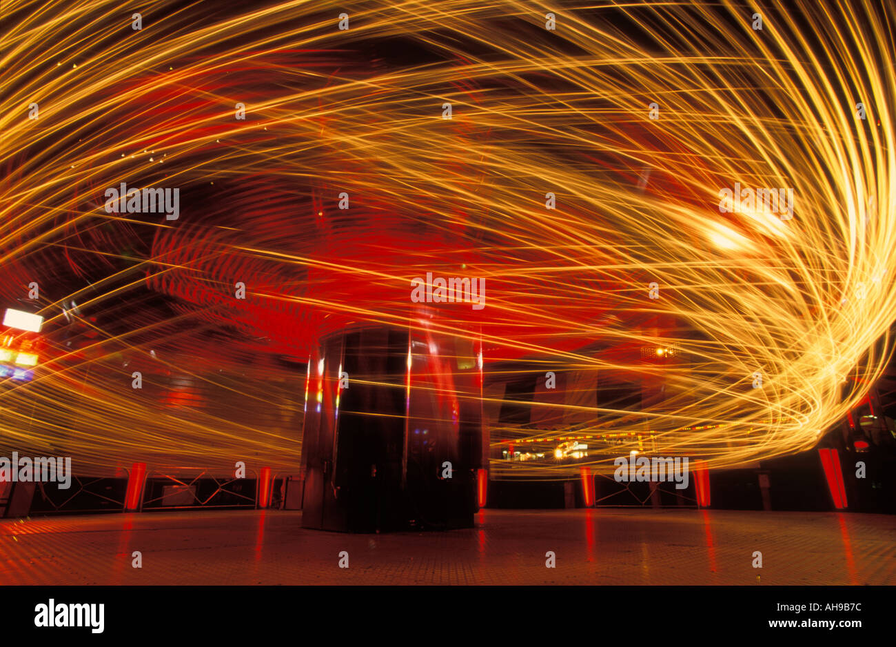 light trails and patterns produced by a fairground carousel ride East ...