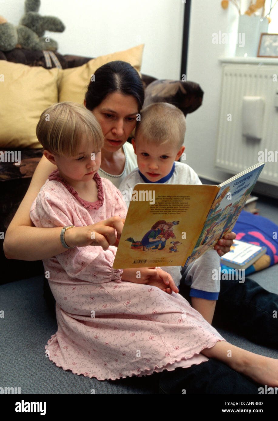 Reading a fairy tale Stock Photo - Alamy