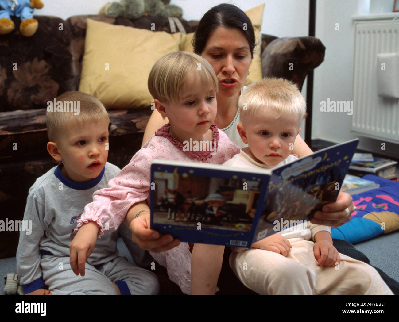 Reading a fairy tale Stock Photo - Alamy