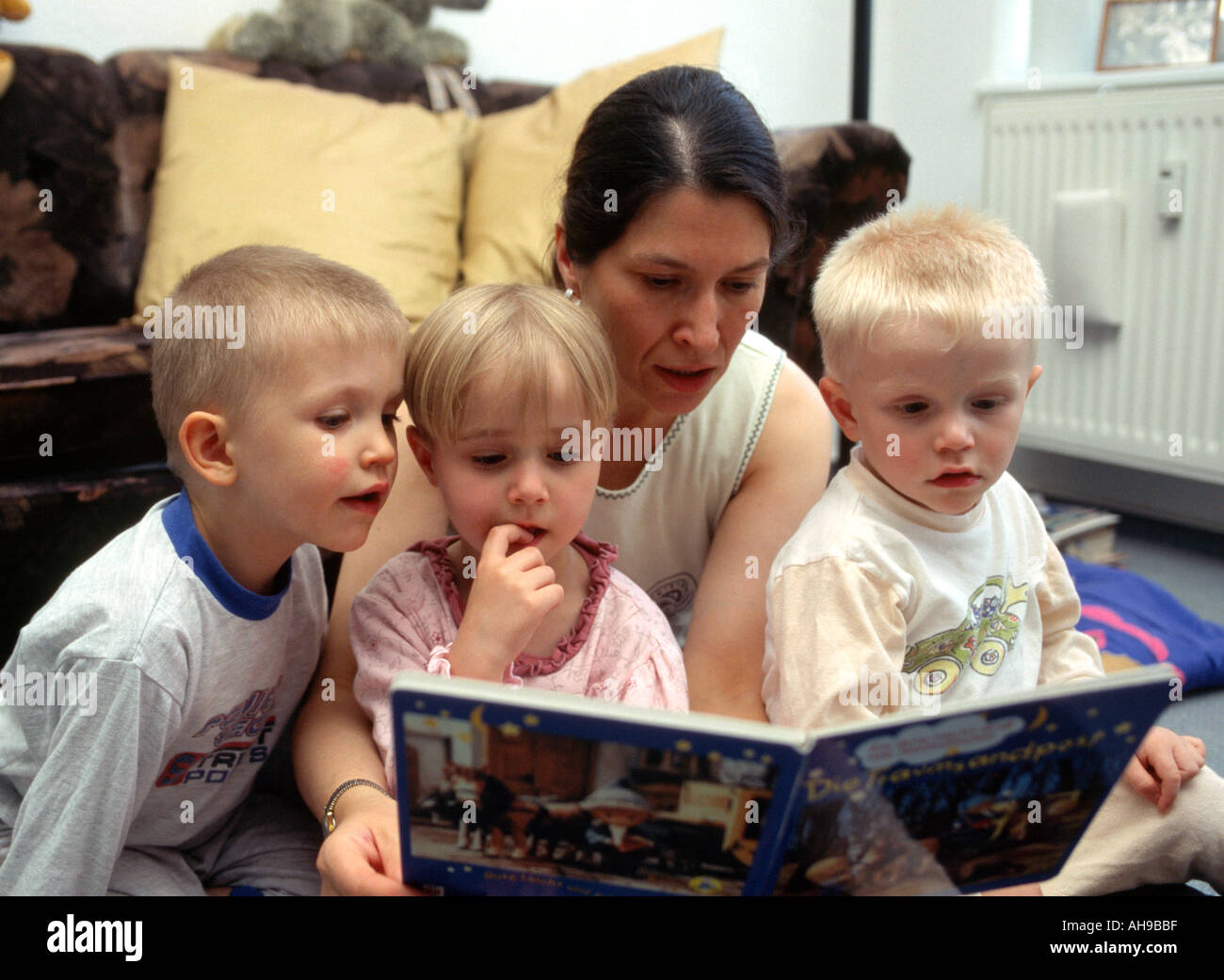 Reading a fairy tale Stock Photo - Alamy