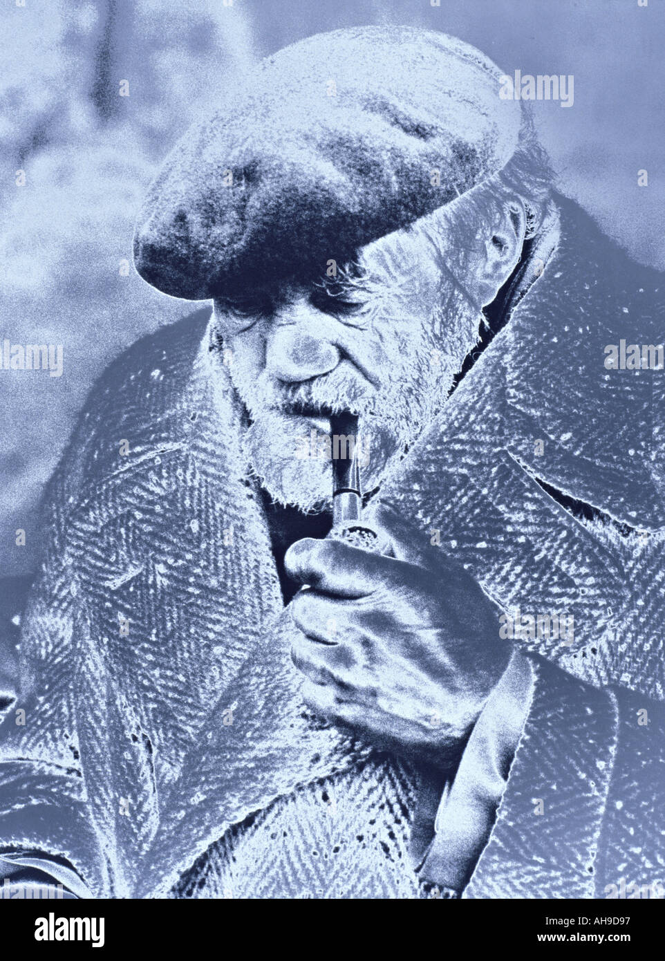 homeless old man smoking a pipe Stock Photo - Alamy