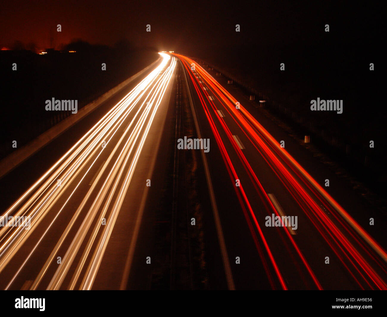 Motorway with light track Stock Photo - Alamy