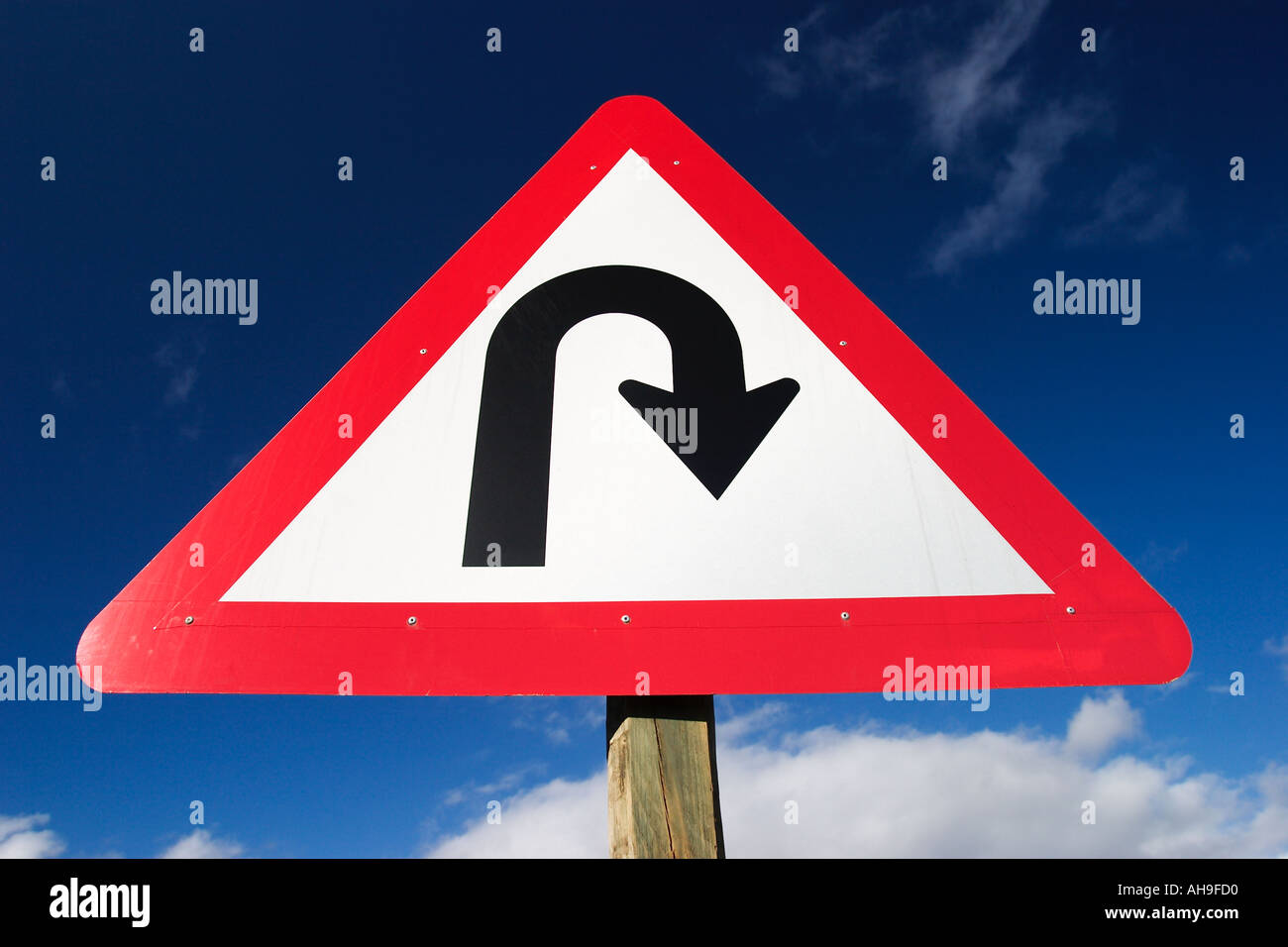 Traffic Shield Listen Sharp Turn in front of blue sky South Africa ...