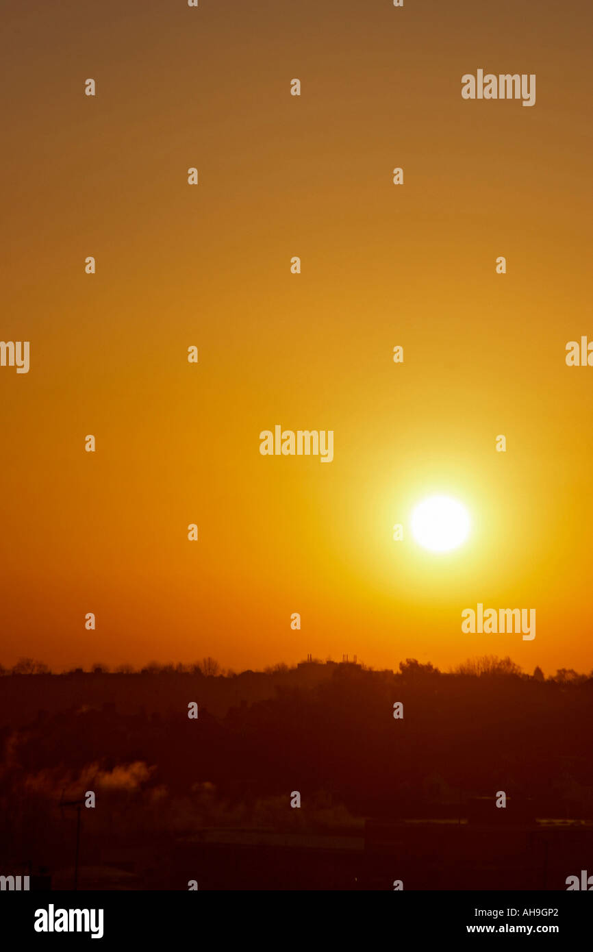 A5 Sunrise sequence of early morning dawn sky over suburban rooftops of ...