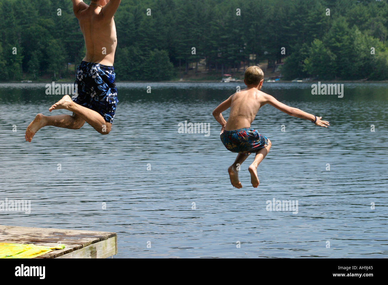 Family dock jump hi-res stock photography and images - Alamy
