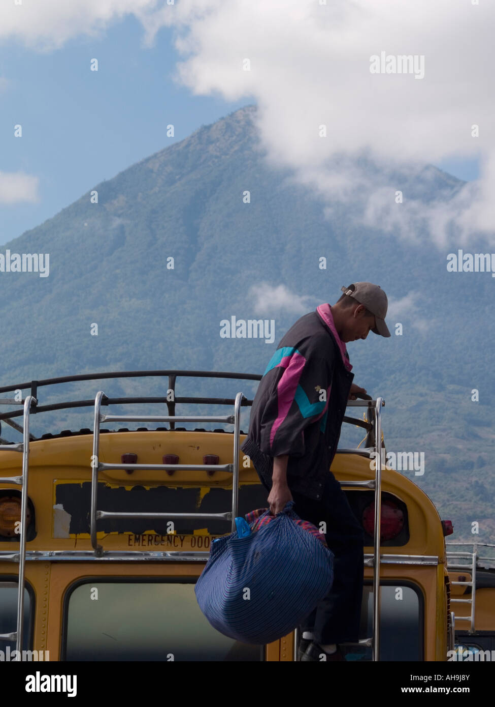 Workers at a bus station in Guatemala Stock Photo - Alamy