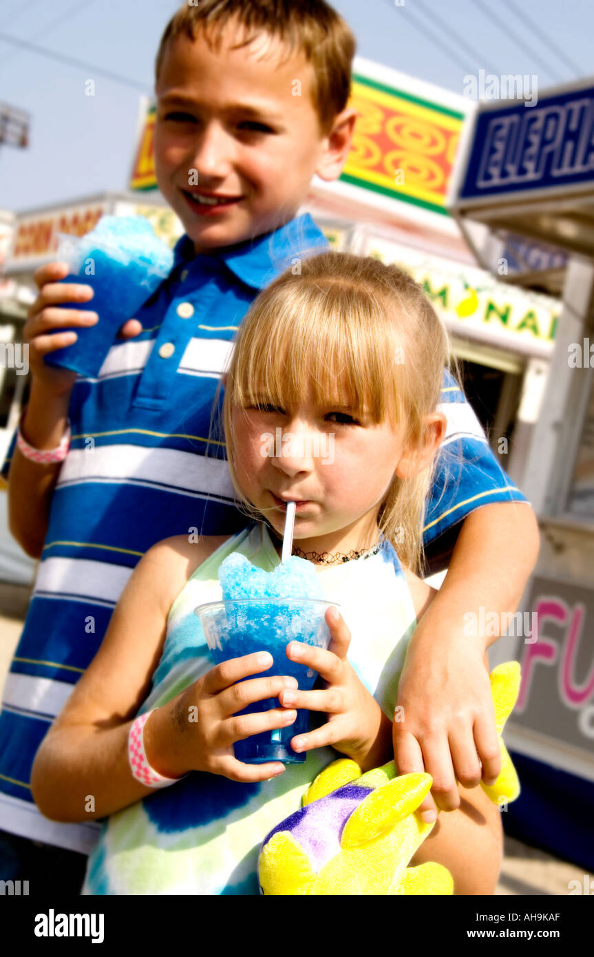 Boy eating shaved ice hi-res stock photography and images - Alamy