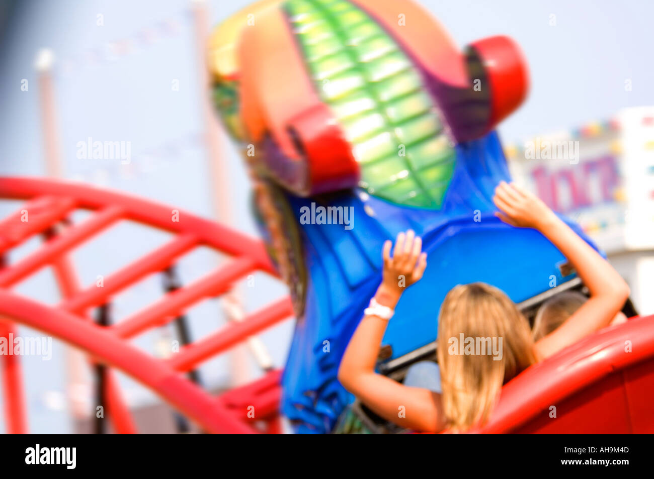 Kids on a carnival ride Stock Photo - Alamy