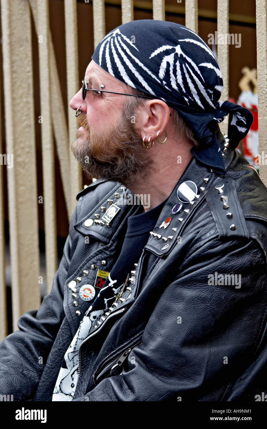 Biker or Hell s Angel type man with leather jacket headscarf beard ear ...