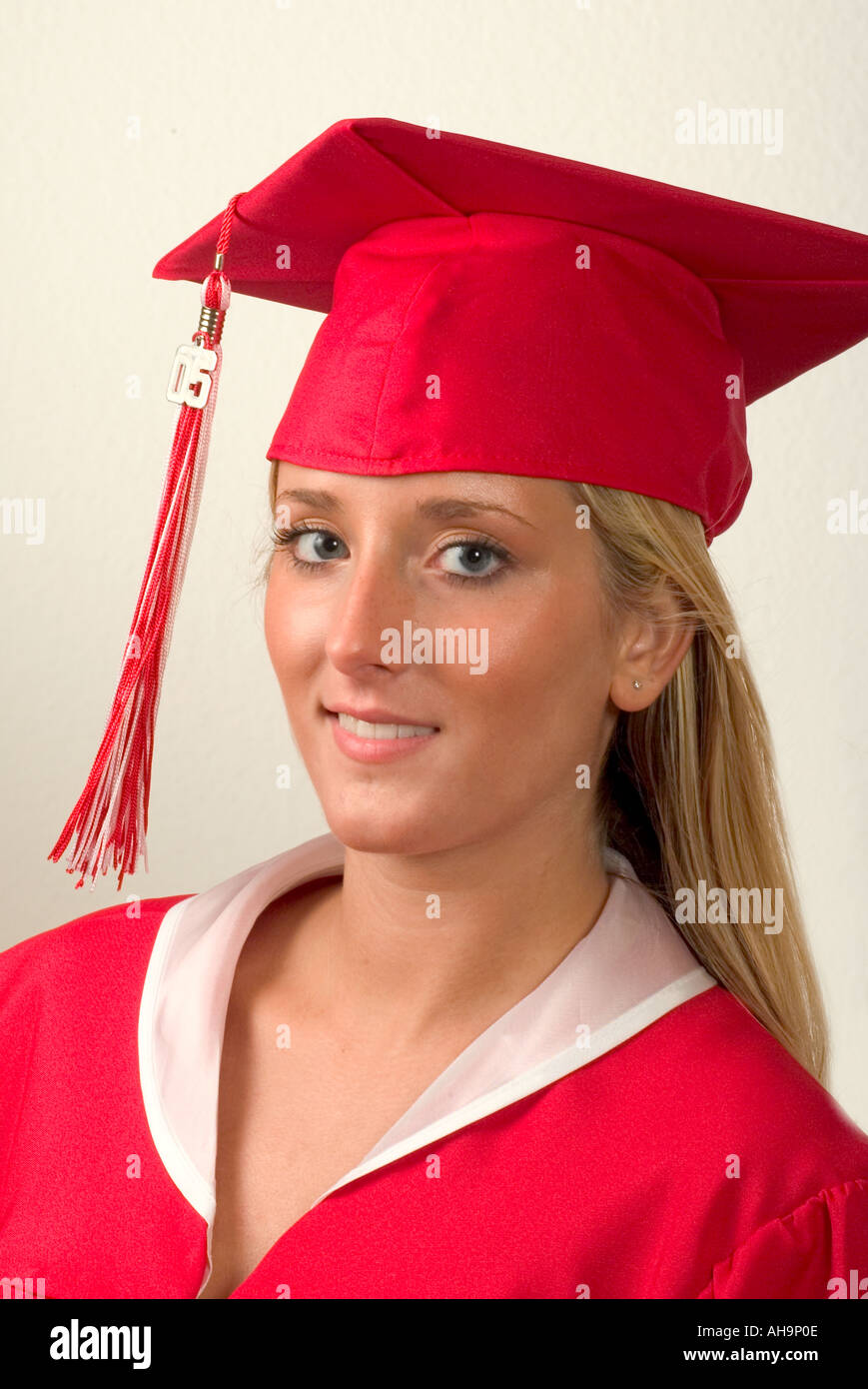 Girl in graduation cap and gown Stock Photo - Alamy