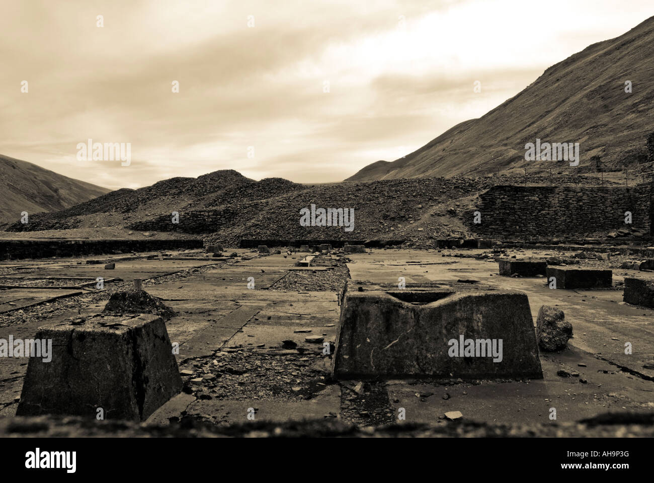 Tinted black and white image of the floor of a deserted lead mining ...