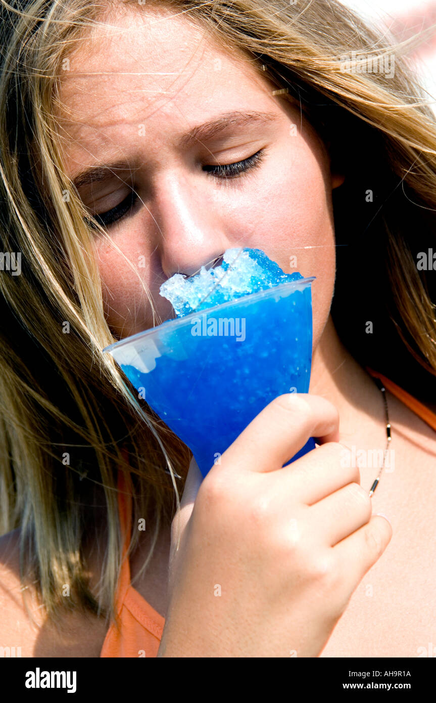 Girl eating snow cone hi-res stock photography and images - Alamy