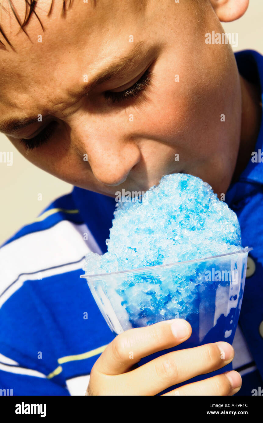 Child eating snowcone hi-res stock photography and images - Alamy