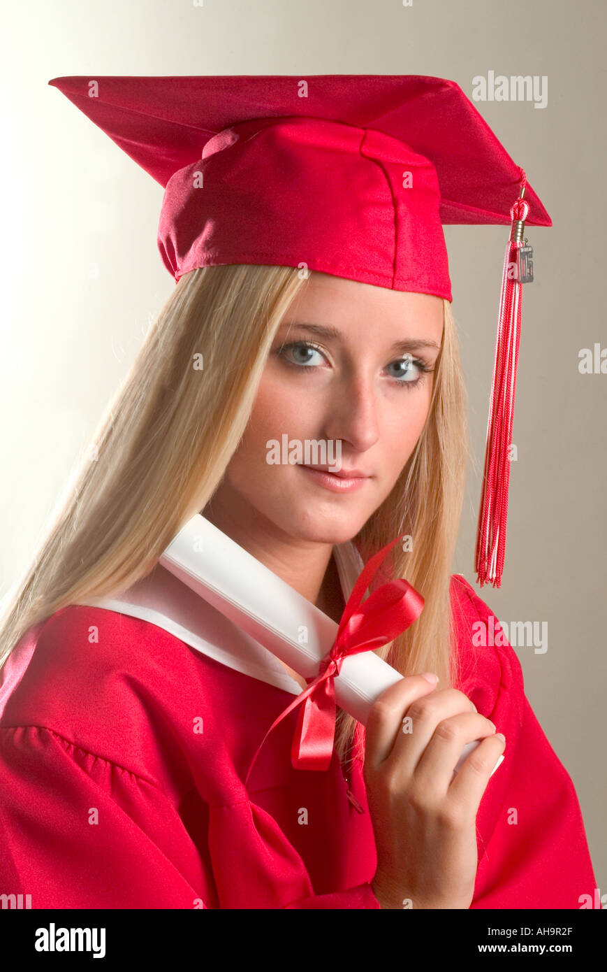 Girl in graduation gown Stock Photo - Alamy