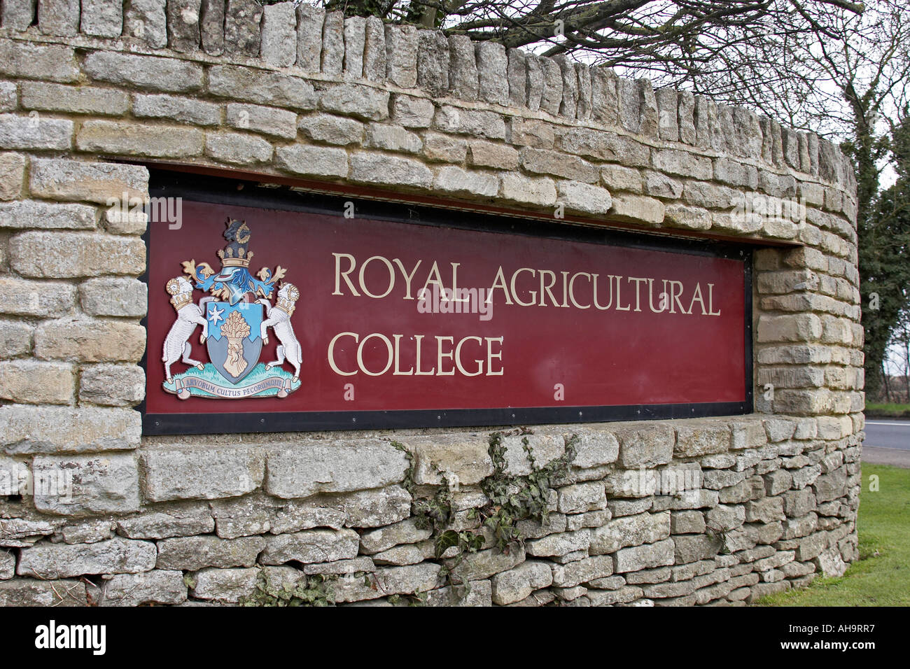 Royal Agricultural College signboard crest and logo in Cotswold hills ...