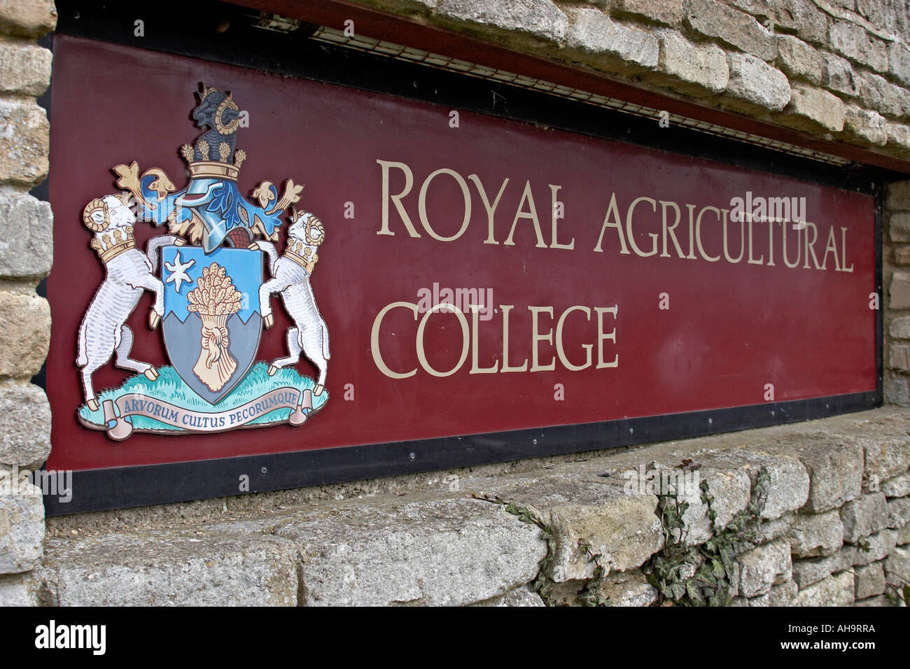 Royal Agricultural College signboard crest and logo in Cotswold hills ...