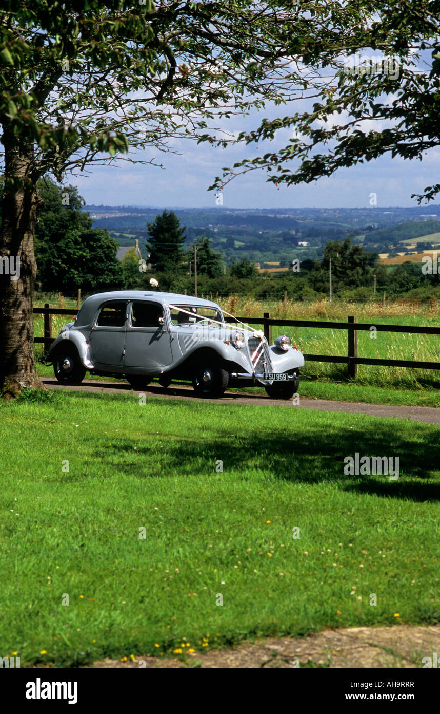 Wedding car driving in front of beautiful view Stock Photo - Alamy