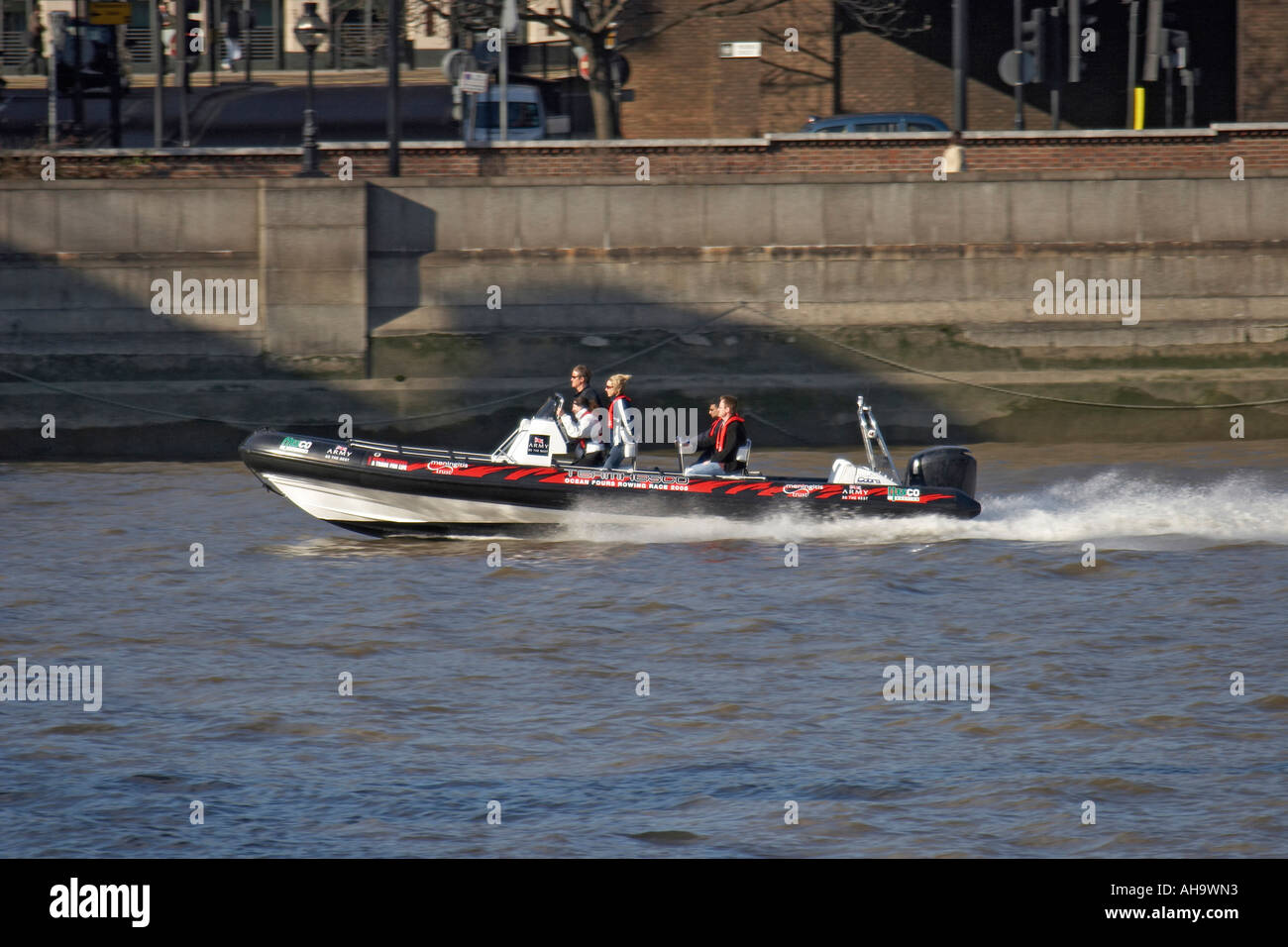 Army fast rib inflatable boat speeding on River Thames London EC4 ...