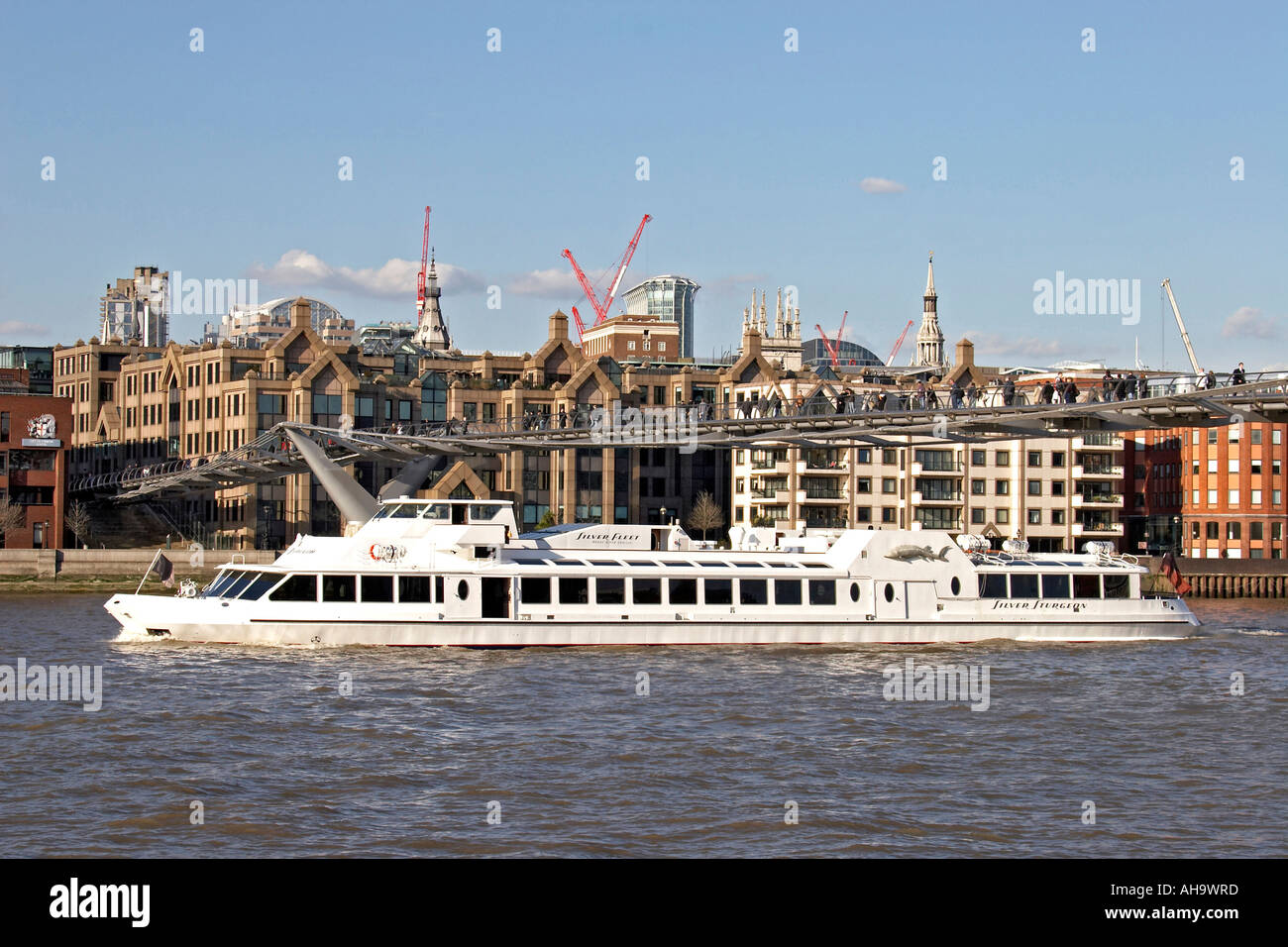 View north across River Thames with Millenium Bridge and Silver Fleet ...