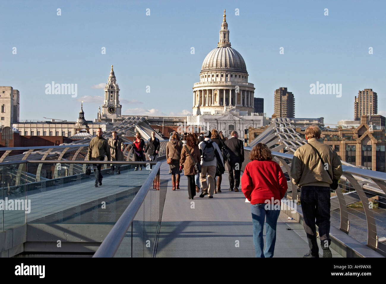 People walking across Millenium Bridge Stock Photo - Alamy