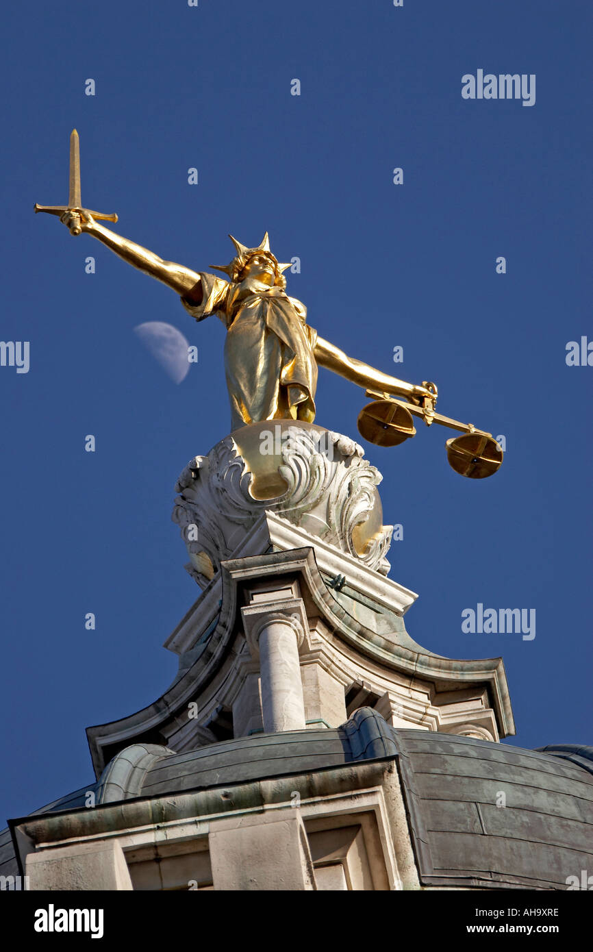 Gold statue justice balance scales hi-res stock photography and images ...