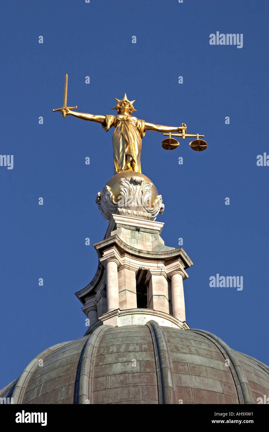 Gold statue justice balance scales hi-res stock photography and images ...