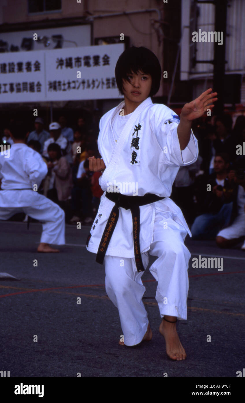 Girl performs karate demonstration on the street in Okinawa Japan Stock Photo - Alamy