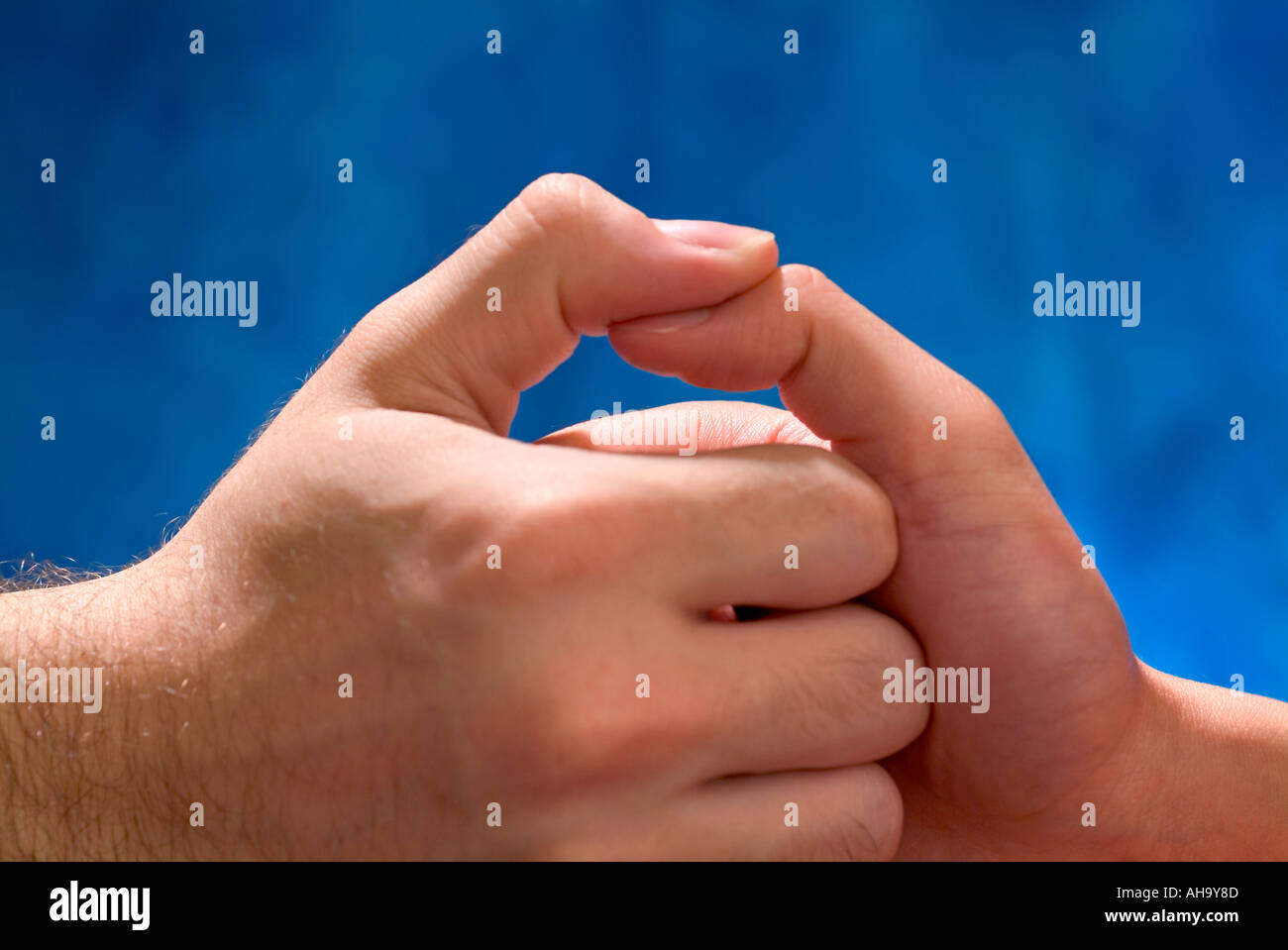 Thumb war game hi-res stock photography and images - Alamy