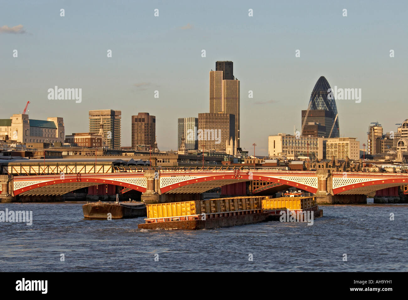 Blackfriars Bridge on office buildings in evening light with River ...