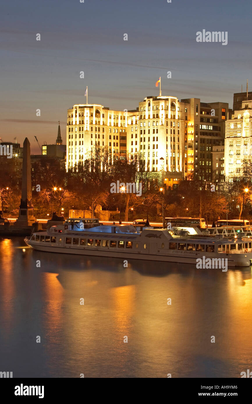 Twilight dusk night view west along River Thames with Adelphi Building ...