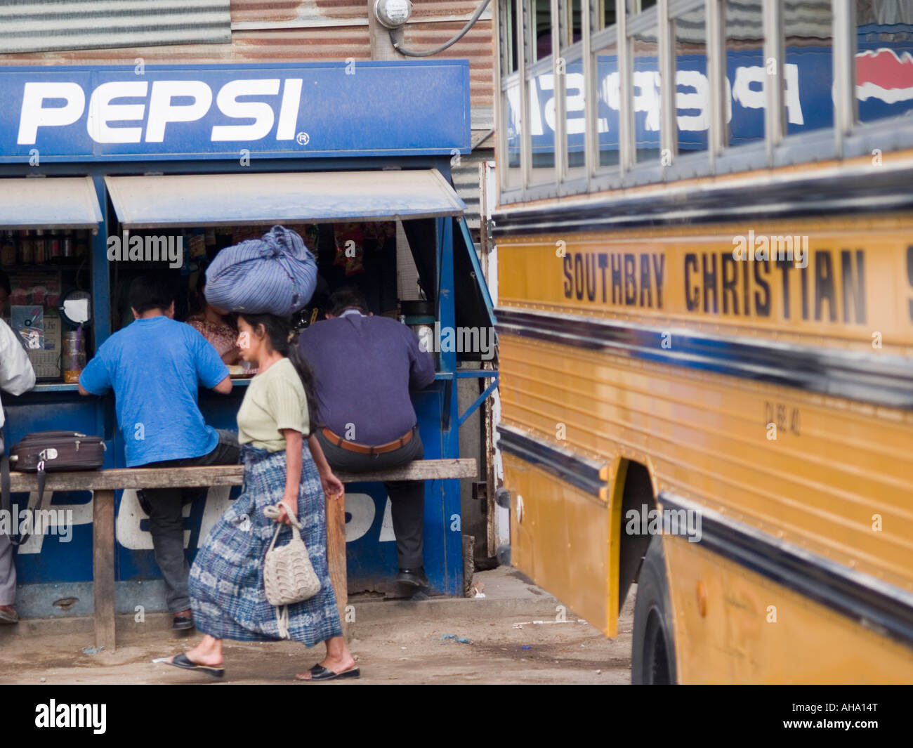 Workers at a bus station in Guatemala Stock Photo - Alamy