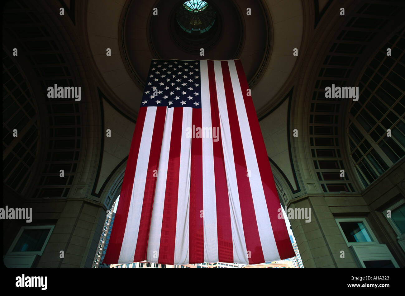 A giant flag hanging in the rotunda of Rowes Wharf, Boston ...
