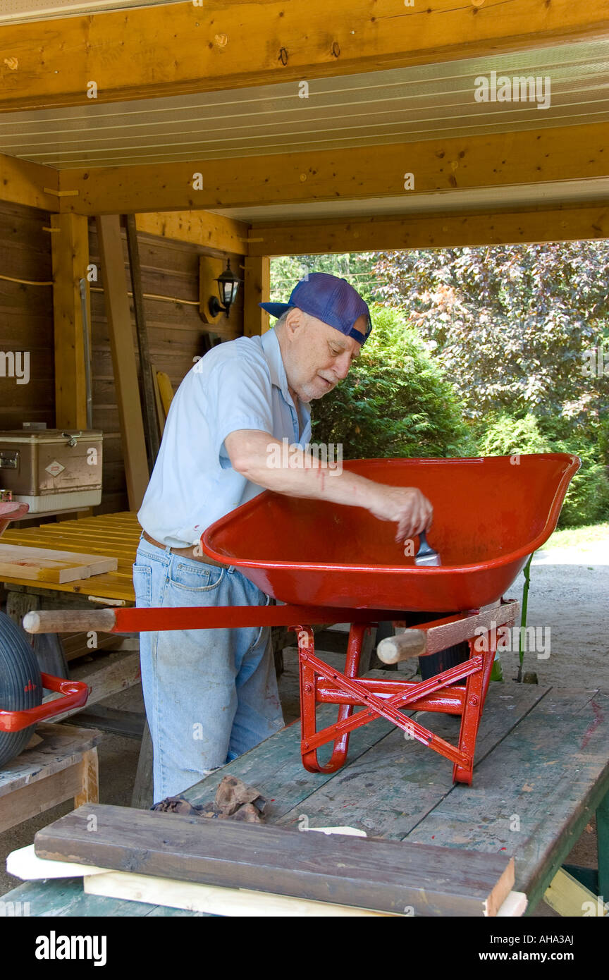 Red wheelbarrow and painting hi-res stock photography and images - Alamy