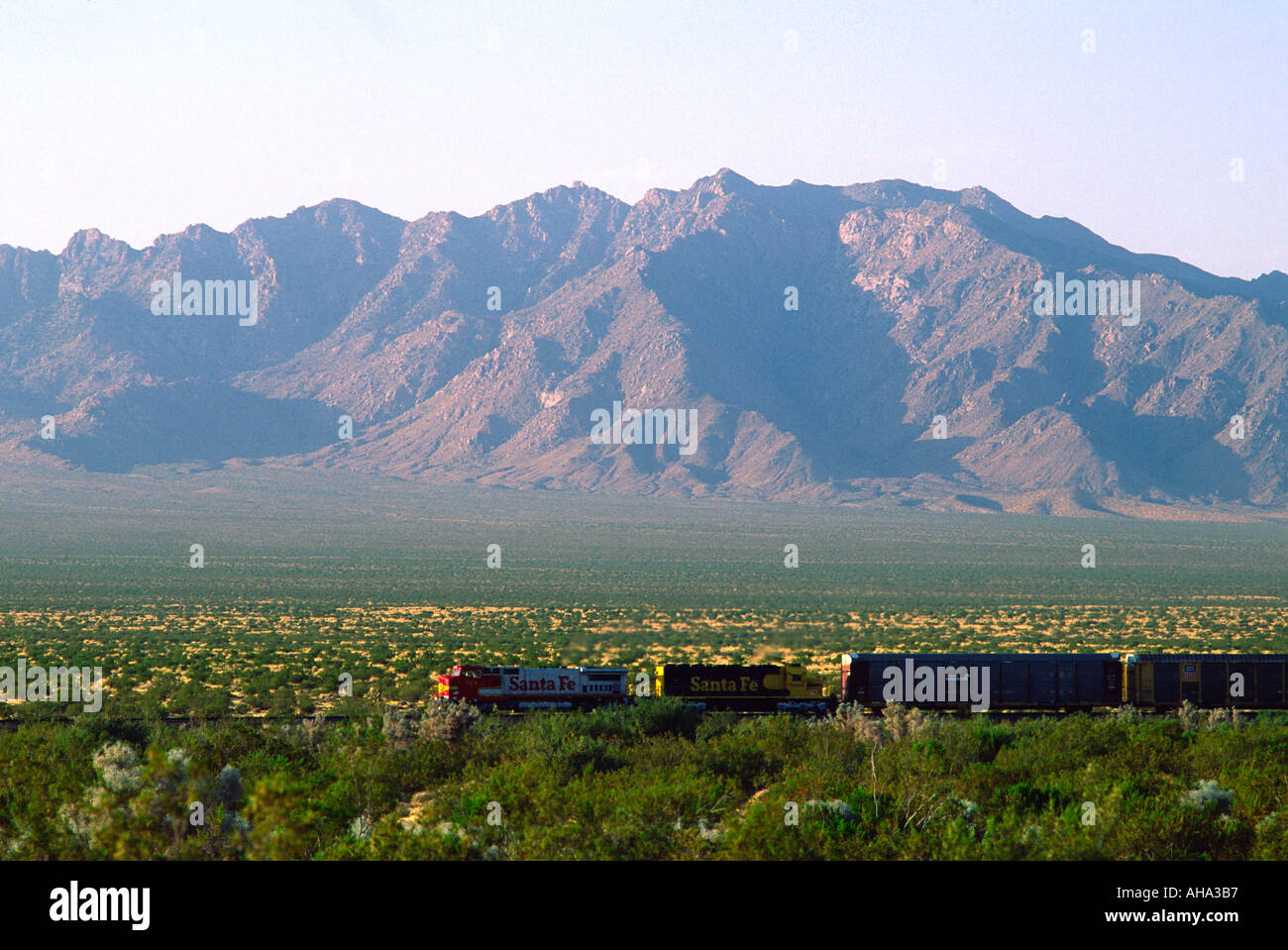 A freight train in the California desert Stock Photo - Alamy