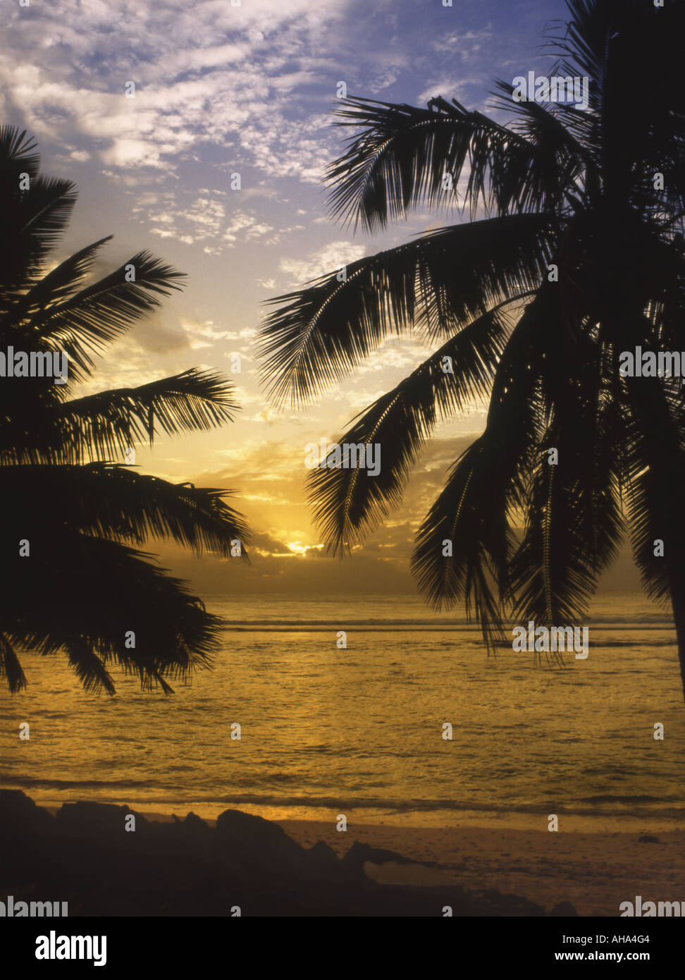 COOK ISLANDS. Rarotonga. Coast and sunset Stock Photo - Alamy