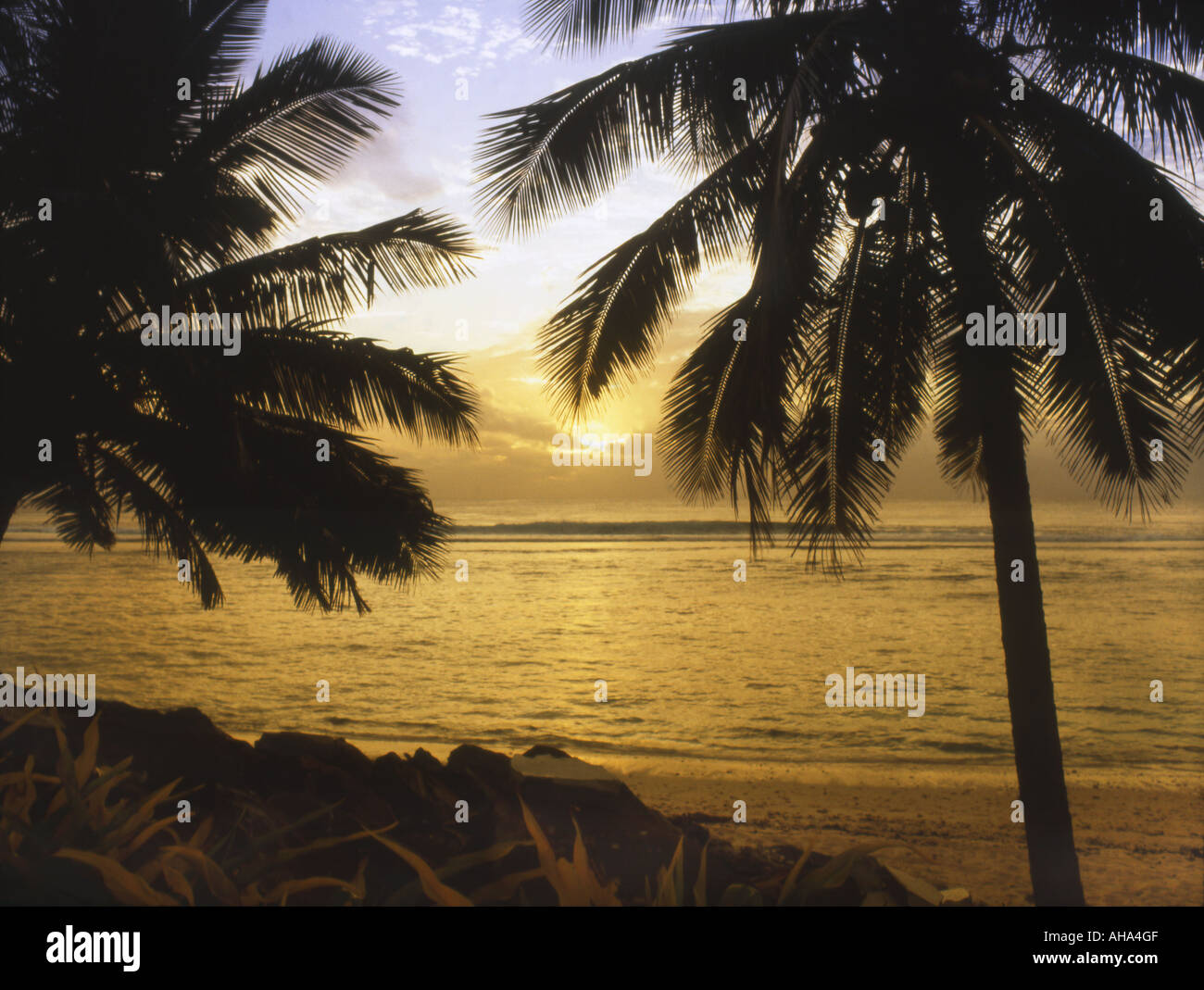 COOK ISLANDS. Rarotonga. Coast and sunset Stock Photo - Alamy