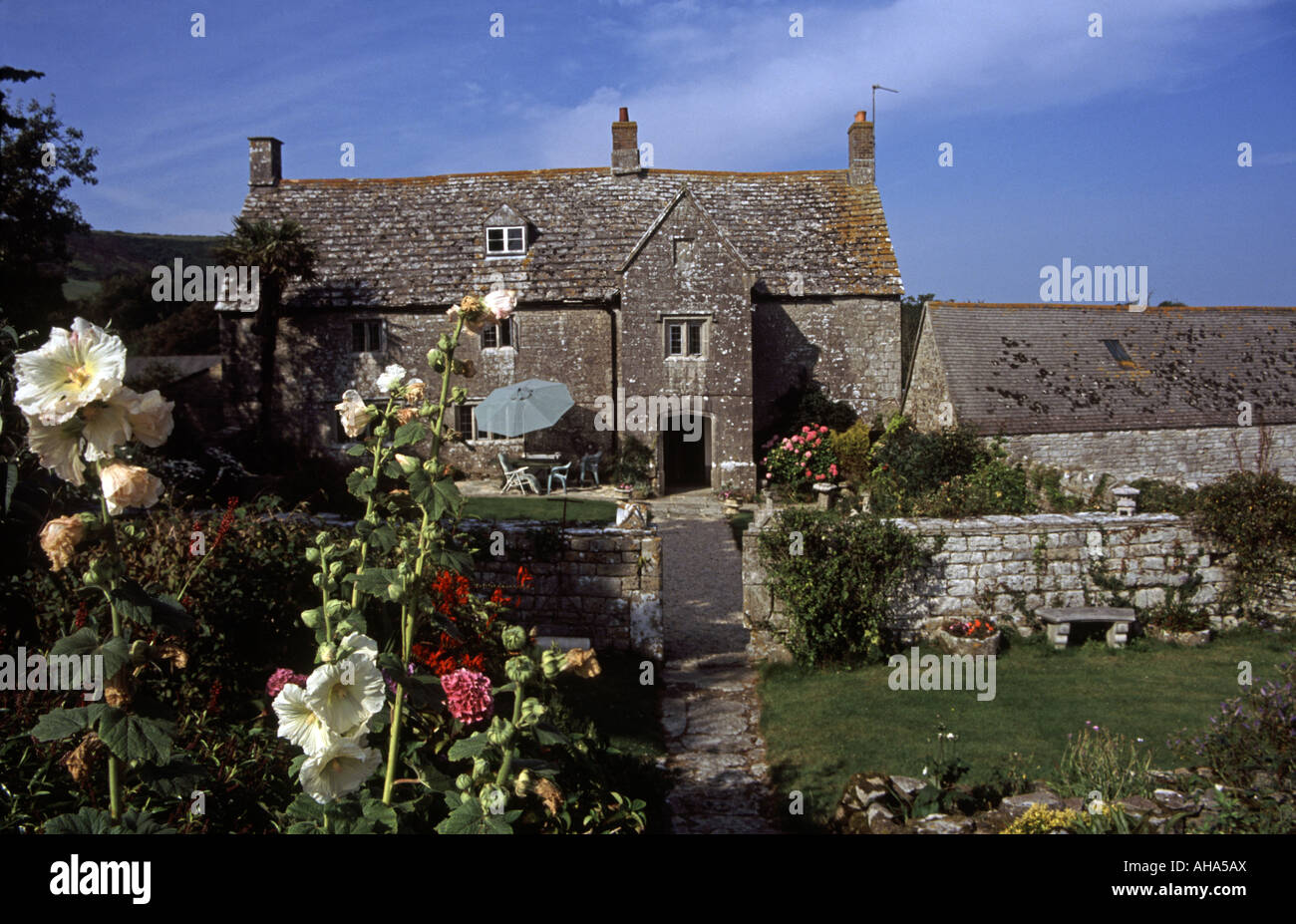 Typical 17th century farmhouse and garden, just inland from the ...