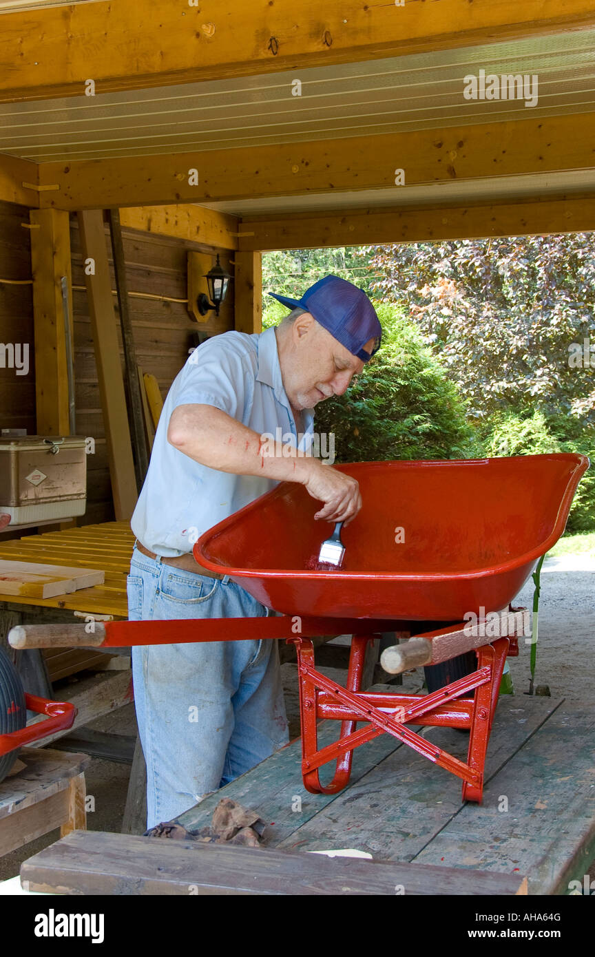 Red wheelbarrow and painting hi-res stock photography and images - Alamy