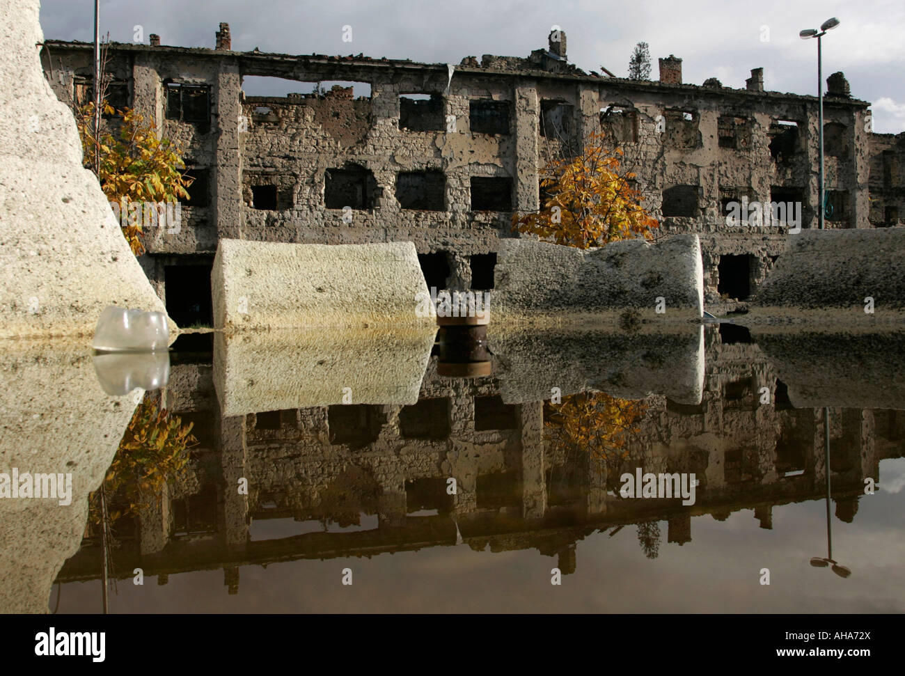 Bomb damaged building in Mostar in Bosnia Herzegovina standing more ...