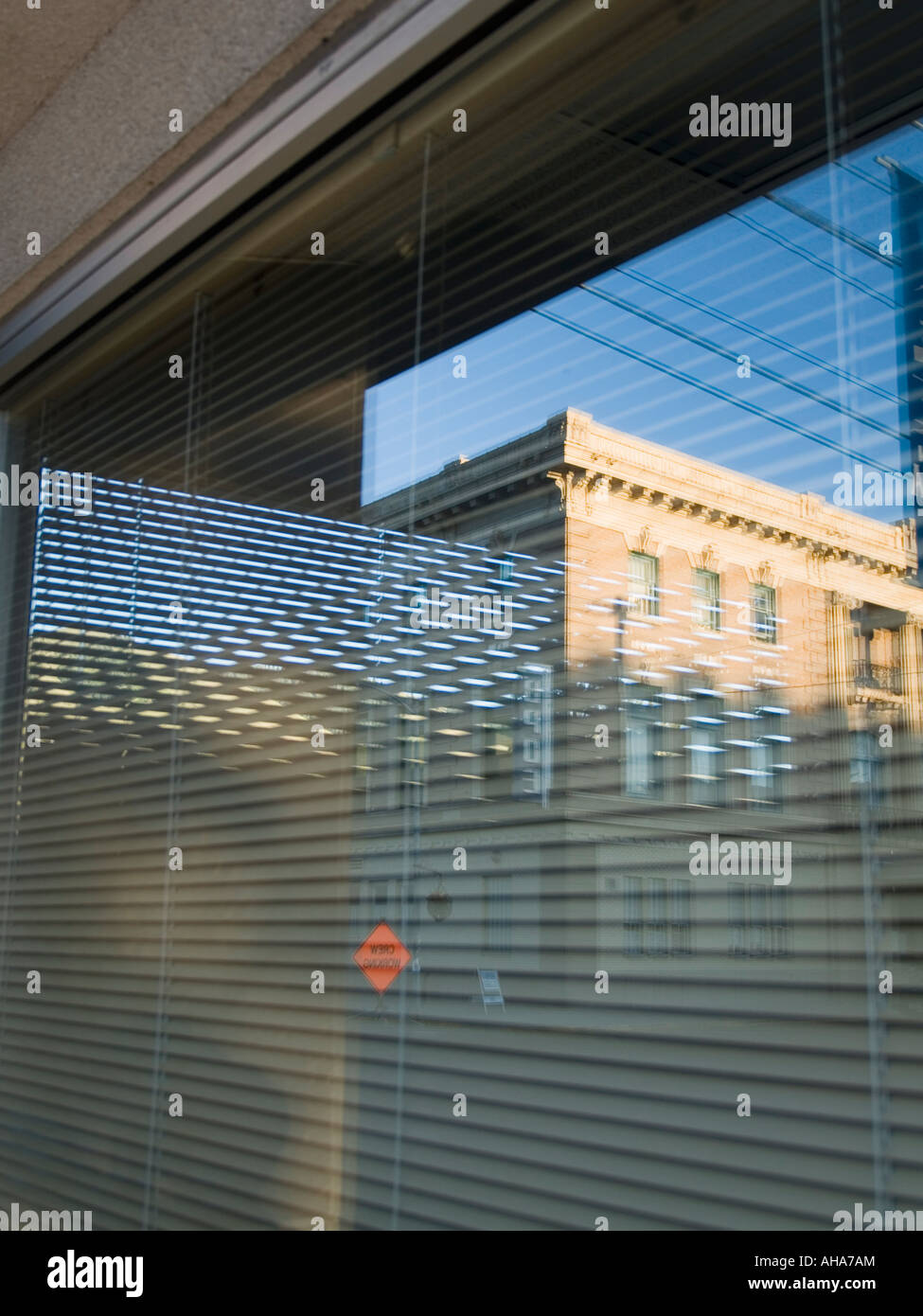 Reflections in storefront windows Stock Photo - Alamy