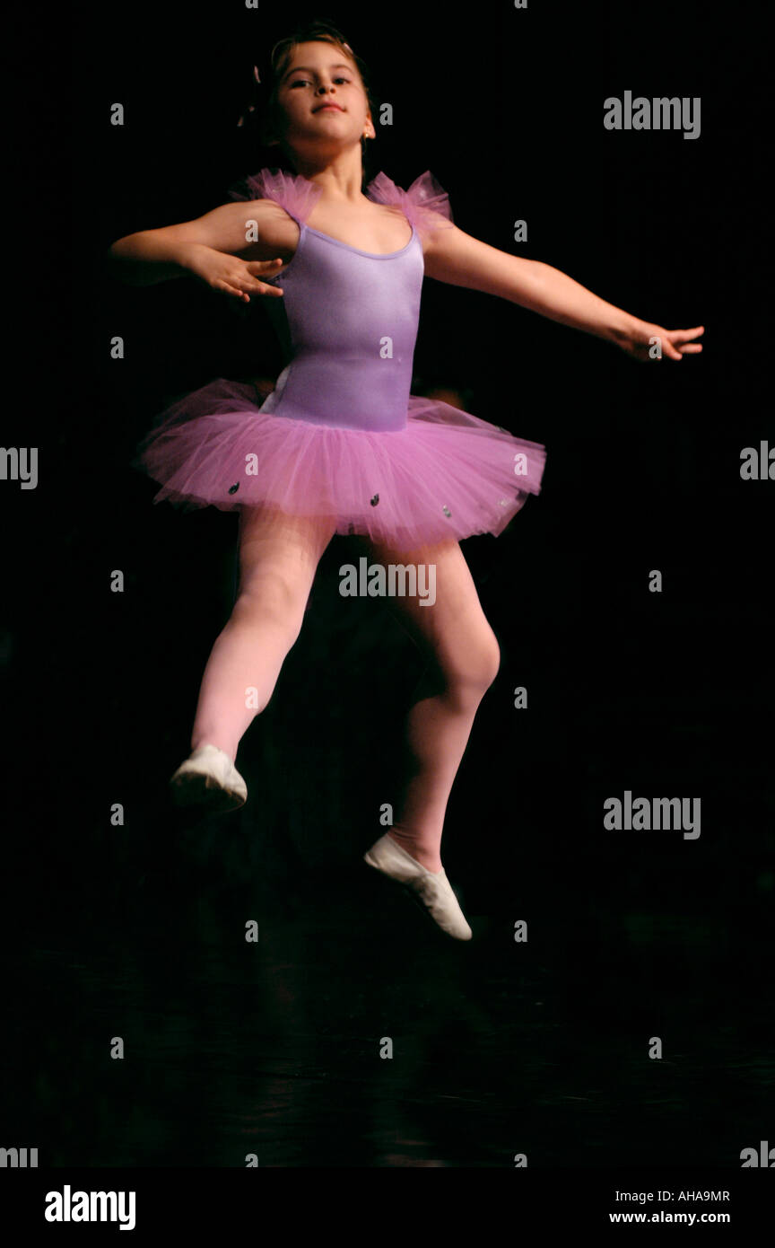 Ballerina girl performing on stage Stock Photo - Alamy