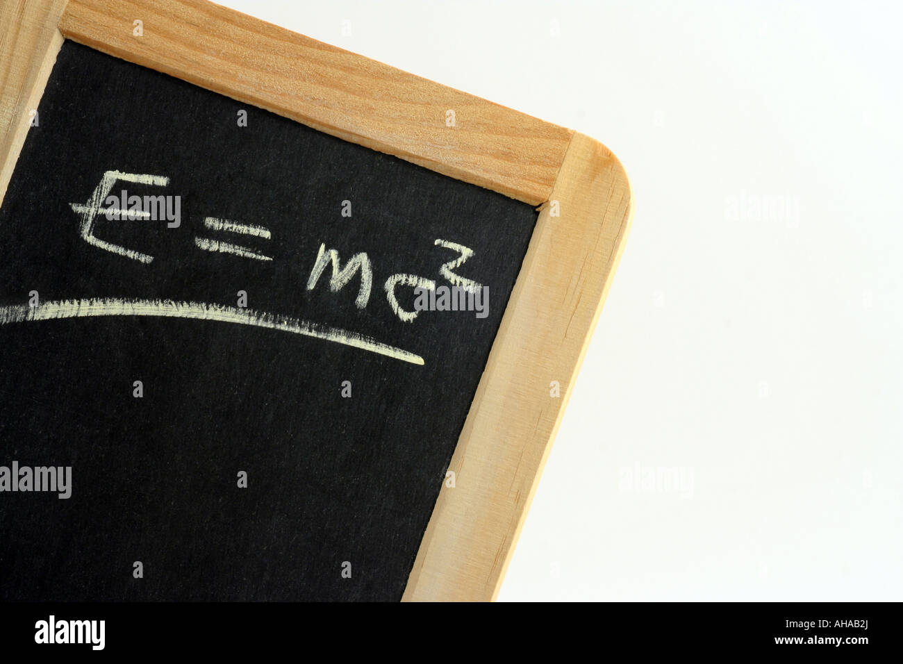 Slate tablet with Albert Einsteins famous equation E=mc2 relating ...